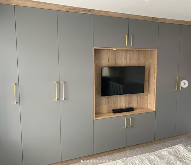 Fitted Wardrobes with Media Panel - Taurus Interiors